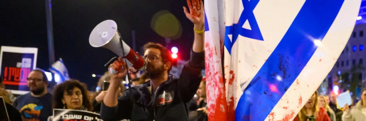 protester-with-red-paint-on-his-hand-marches-through-the-streets-after ...
